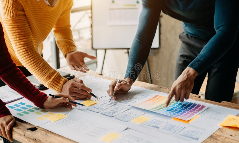 Close Up View of UI Developer Team Brainstorming on Their Project with ...