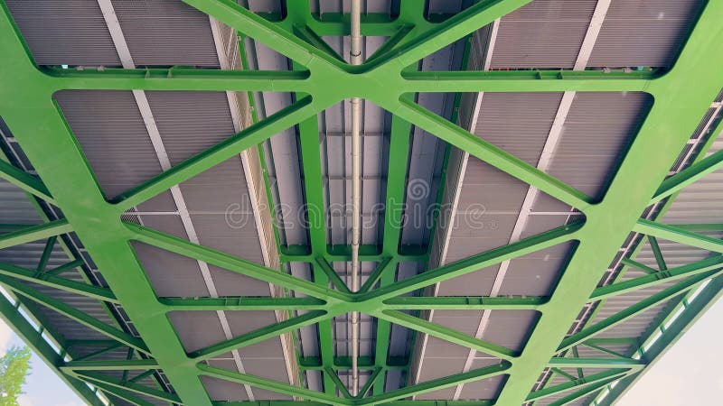 A Close-up View of the Underside of a Green Steel Bridge, Showcasing ...