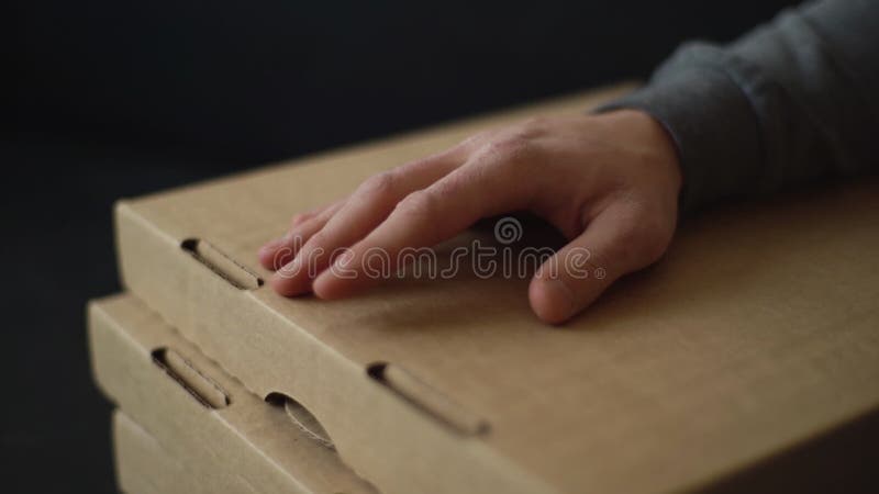 Close-up View of Unrecognizable Delivery Man Tapping on Cardboard Pizza ...
