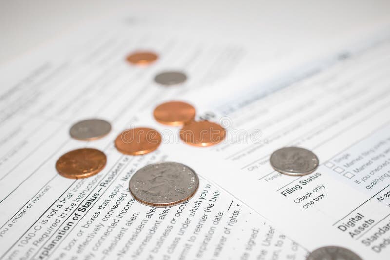 Close Up View of USA Mint Coins on Tax Documents Stock Image - Image of ...