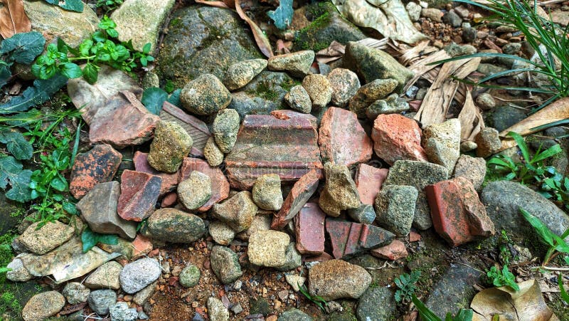 A Close-up View of Various Rocks and Broken Bricks Scattered on the ...