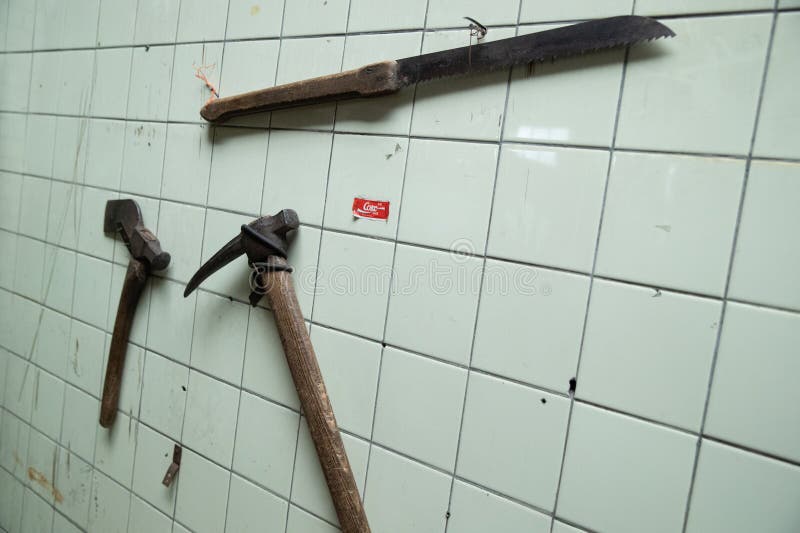 Vintage Mining Tools Displayed on Tiled Wall – Historical Mining ...