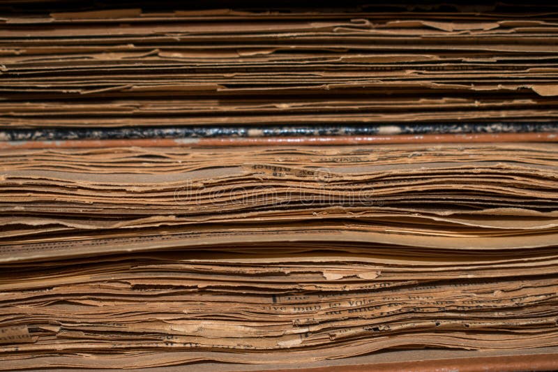 Close-Up View of Vintage Newspaper Stack Showing Aged Pages Stock Photo ...
