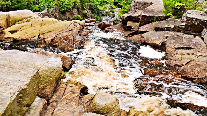 Water flow on rock stock photo. Image of view, flow - 369631558