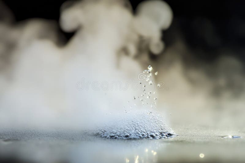 Close-up View of a Water Fountain with Steam Rising from the Surface ...