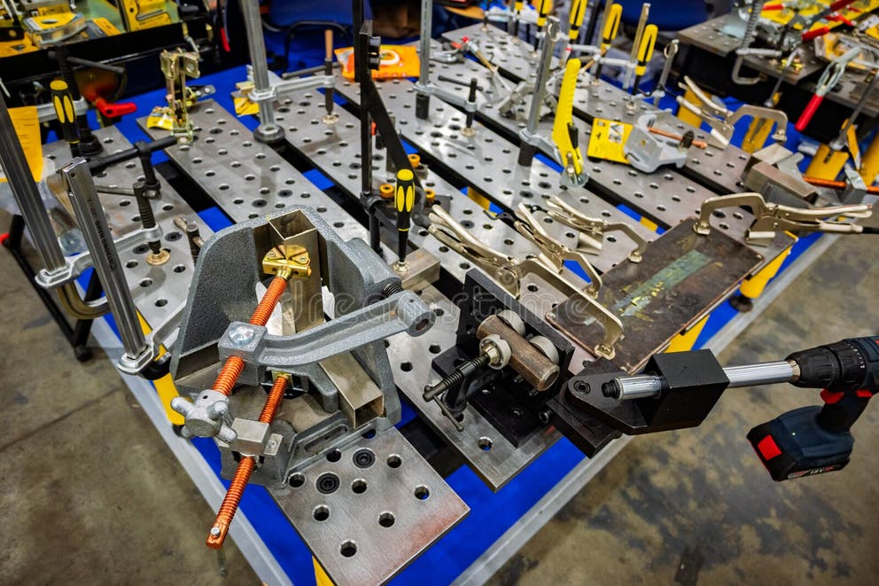 A Close Up View of a Welding Table Setup with Various Clamps and Tools ...
