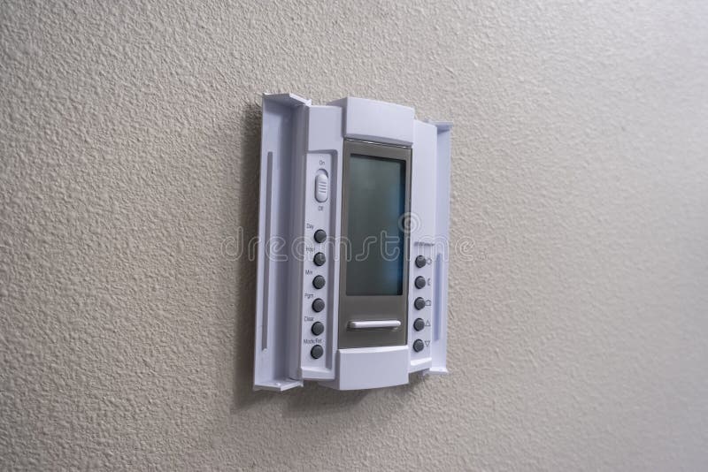 Close Up View of a White Air Cooling and Heating Control Panel on an ...