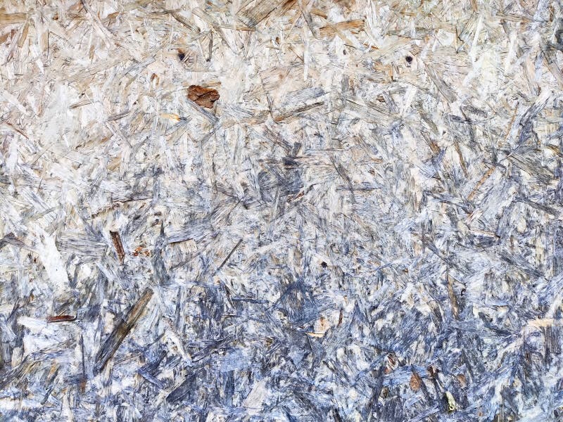 A Close-up View of a White and Gray Oriented Strand Board. Background ...