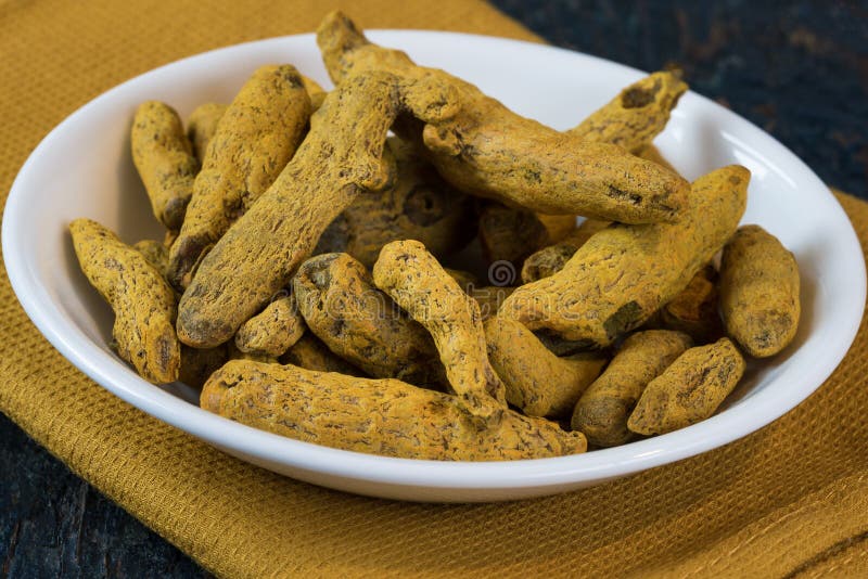 Whole Turmeric Root in a Bowl Stock Image - Image of turmeric, yellow ...