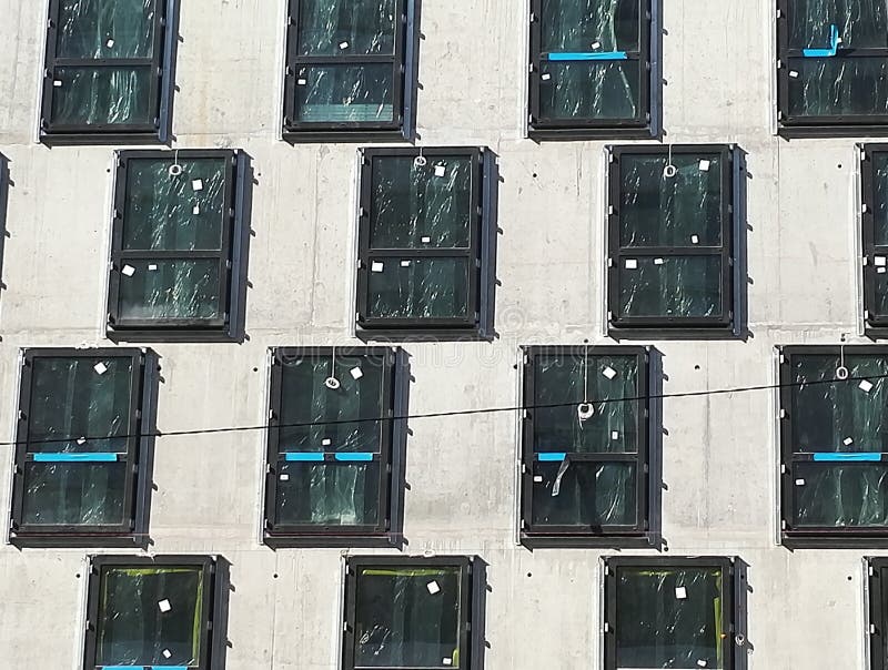 Close-up View of Windows Lined Up on a Building Under Construction ...