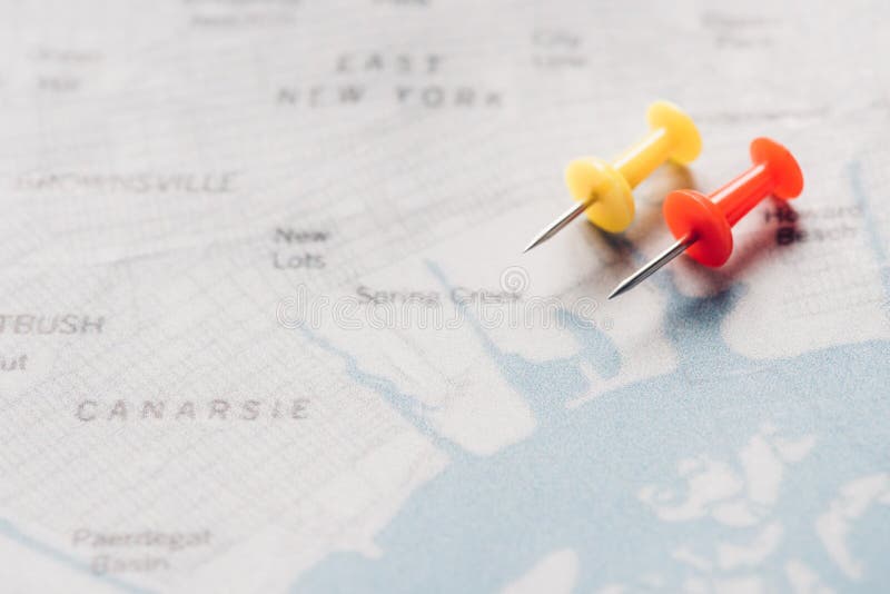 Close Up View of Yellow and Red Pins on Map Stock Image - Image of ...