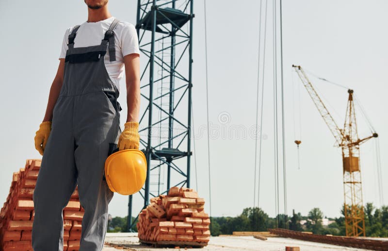 Close Up View. Young Construction Worker in Uniform is Busy at the ...