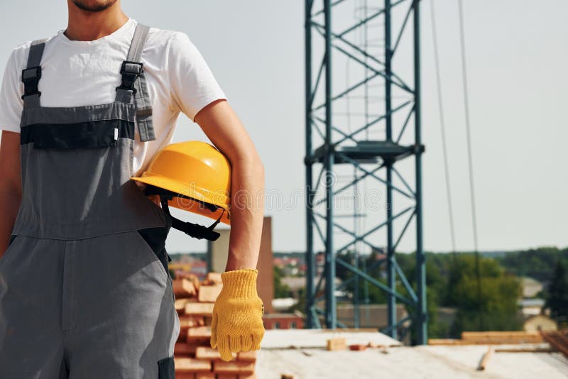 Close Up View. Young Construction Worker in Uniform is Busy at the ...