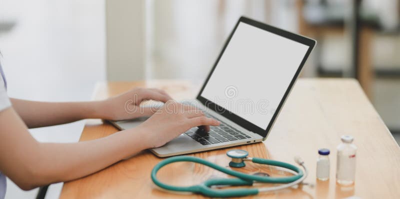 Close-up View of Young Female Doctor Examining the Patient Chart while ...