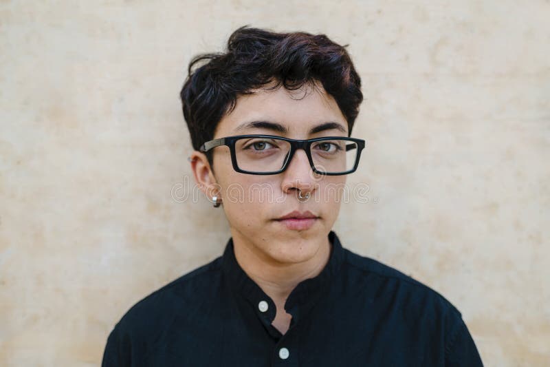 Close Up View of a Young Transgender Man Looking at Camera. Stock Image ...