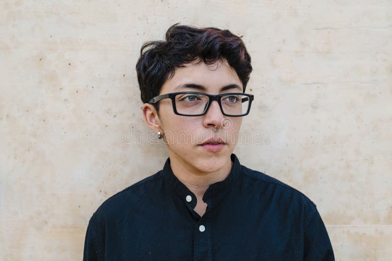 Close Up View of a Young Transgender Man Looking on a Wall. Stock Image ...