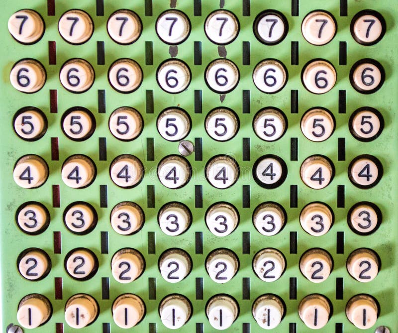 Close Up of Vintage Adding Machine Keys on a Green Background Stock ...