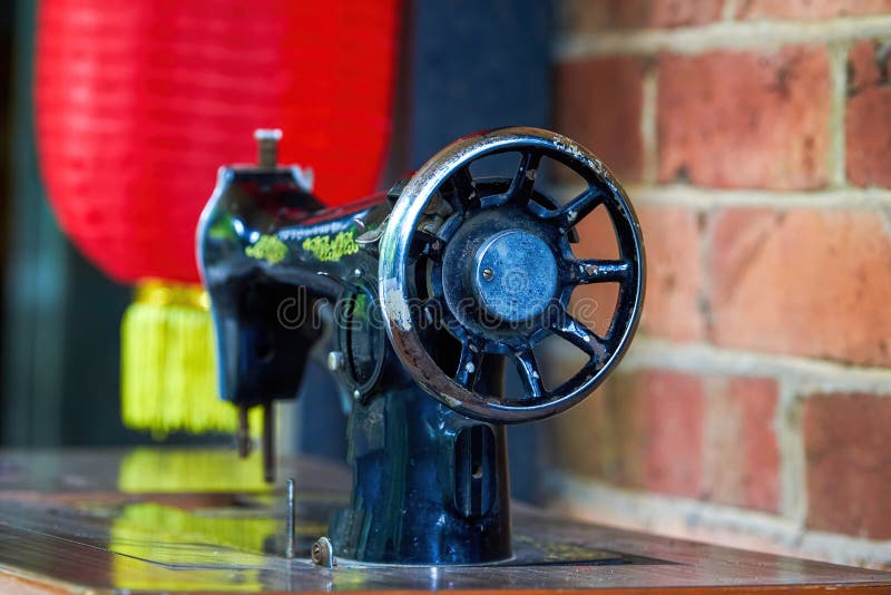Close-up of a Vintage Chinese Tailor with a Sewing Machine Stock Image ...