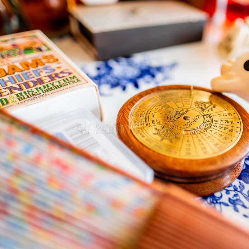 Close-Up of a Vintage Perpetual Calendar with Decorative Elements in a ...