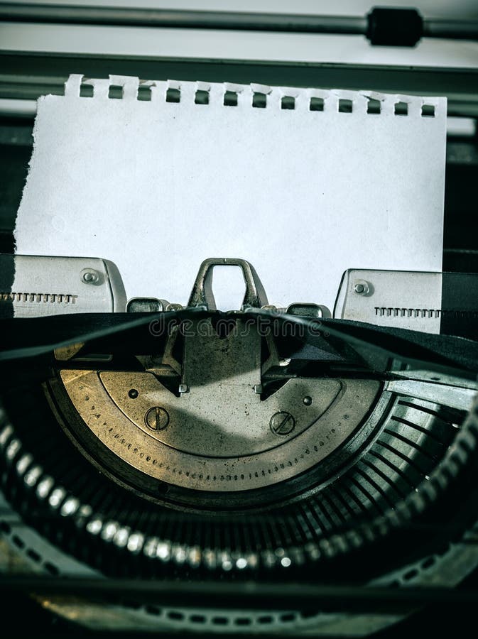 Close-up of a Vintage Typewriter with Blank Paper Inserted Stock Image ...