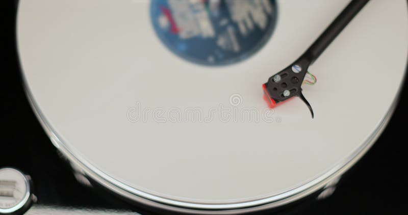 Close-up of a Vinyl Record Spinning on a Retro Turntable from Top View ...