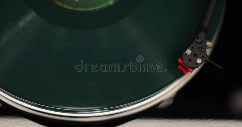 Close-up of a Vinyl Record Spinning on a Retro Turntable from Top View ...