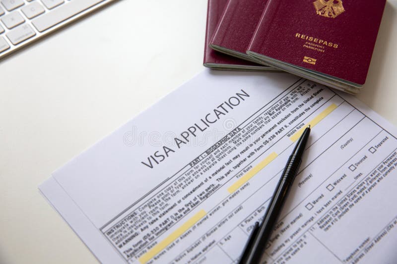 Close Up of a Visa Application Document with a German Passport Stock ...