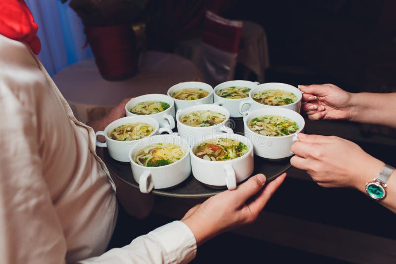 Close Up of Waiter Serving Food in a Restaurant. Soft Focus. Stock ...