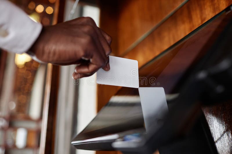 Close Up of Waiter Tapping Computer Screen with ID Card Stock Image ...