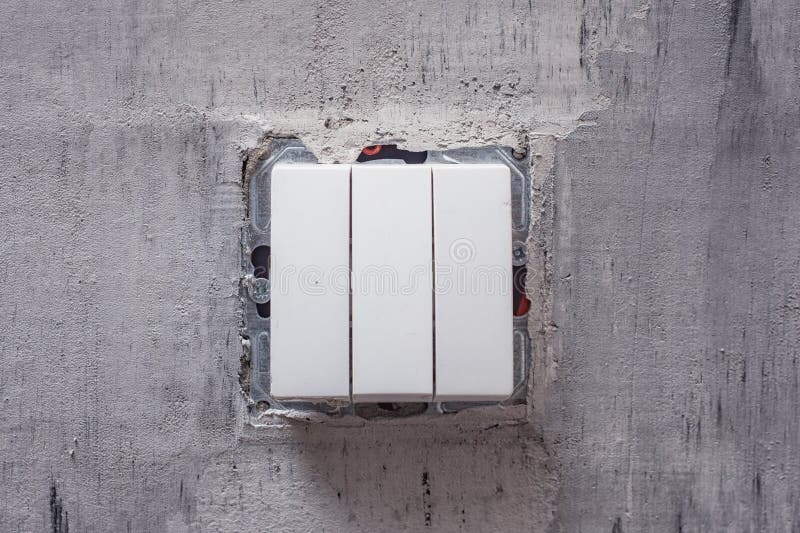 Close-Up of a Wall Light Switch Installed during Renovation. Light ...
