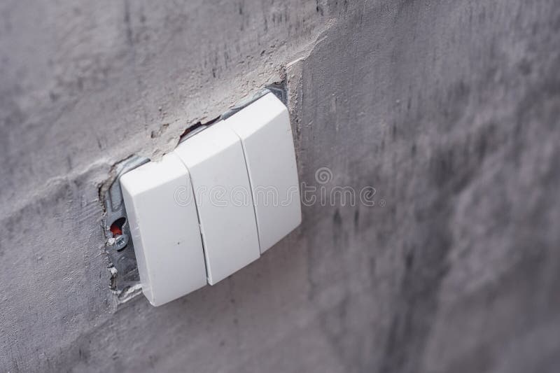Close-Up of a Wall Light Switch Installed during Renovation. Light ...
