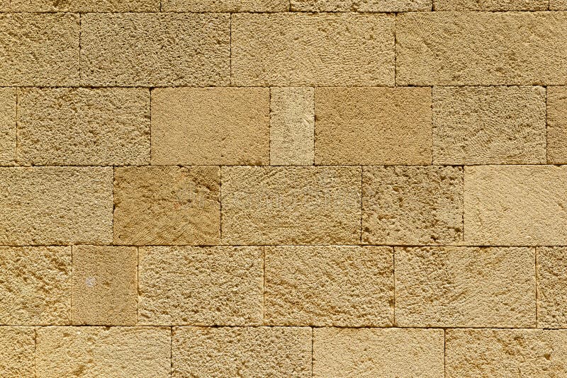 Close Up of a Wall Made of Rectangular, Tan Stone Blocks. Mediterranean ...