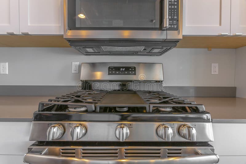 Range with Cooktop and Oven Inside the Modern Kitchen of a New House ...