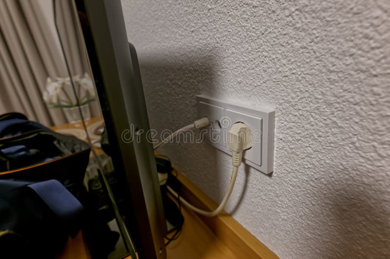 Close-Up of Wall Socket with Power and Antenna Plugs Stock Image ...
