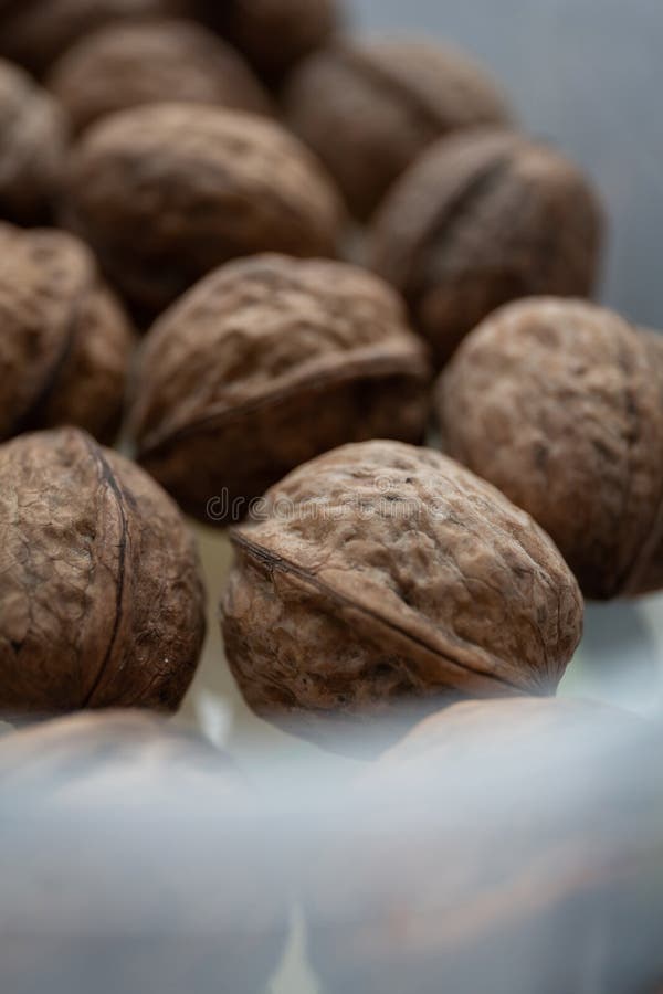 Close Up of Walnuts on a Kitchen Table in a Container Stock Image ...