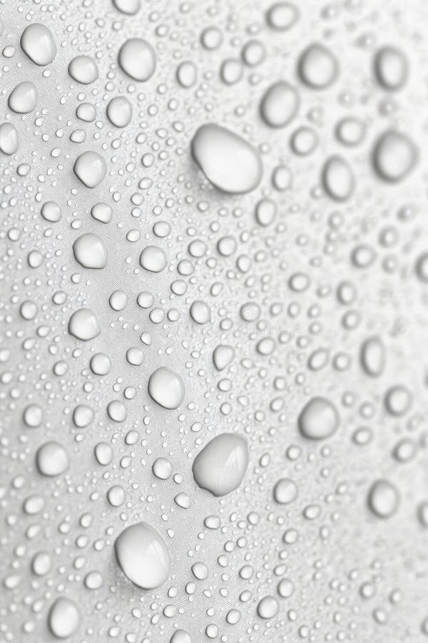 Close-Up Water Beads on a Smooth, White Surface, Hydrophobic Coating ...