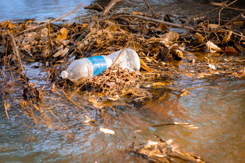 Close-up on Water Bottle Floating in the River Environment Pollution ...