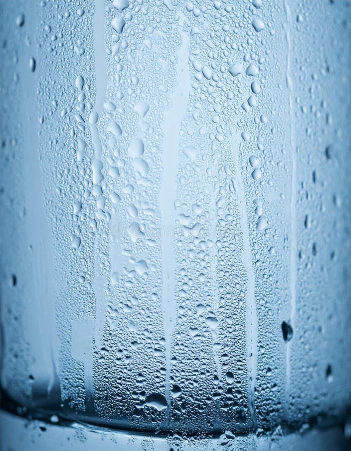 Close Up of Water Condensation on Clear Glass Surface with Blue ...
