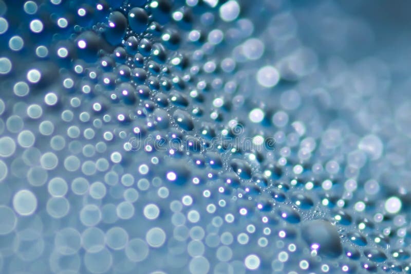 Close Up Water Drop Condensation with Blue Blur Bokeh Stock Image ...
