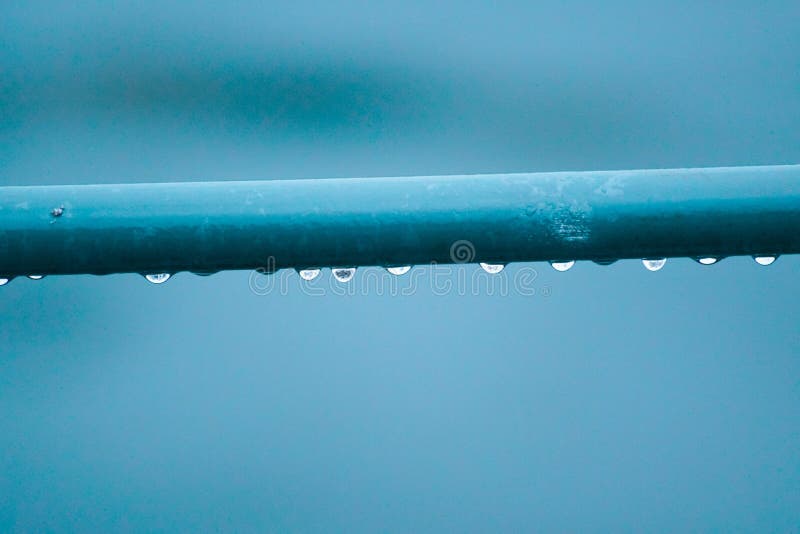 Close Up of Water Drops on Blue Metal Pipe Stock Image - Image of ...