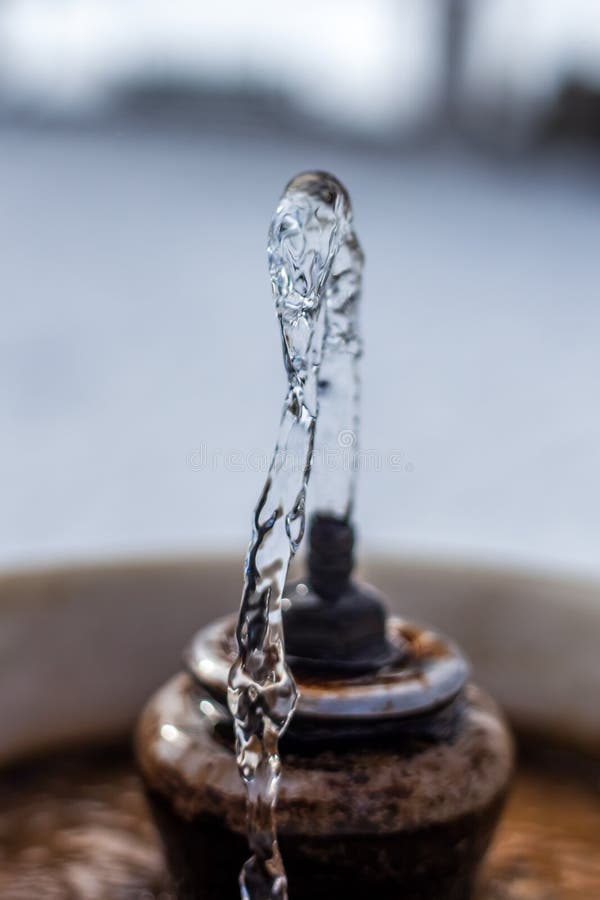 Close Up Water Drops Flowing from Fountain Stock Image - Image of green ...