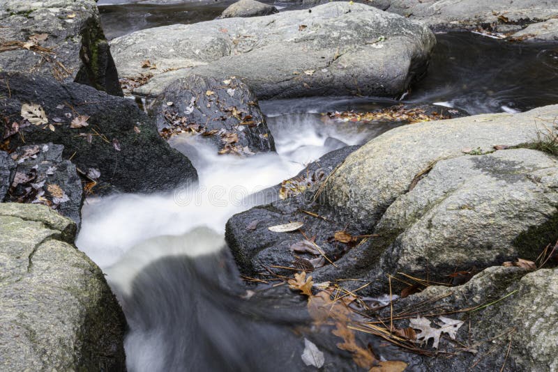 Close Up of Water Flowing between Rocks Stock Image - Image of rocks ...