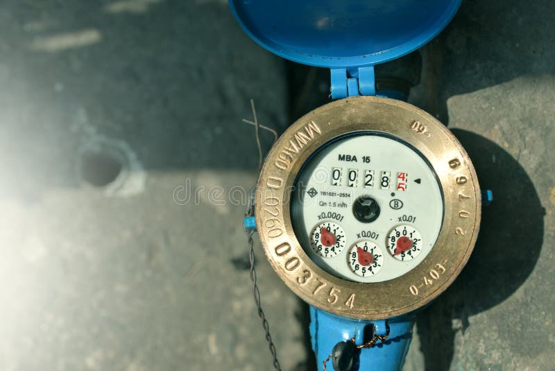 Close Up Water Meter Blue Color. and a Hose with Flowing Water. Stock ...