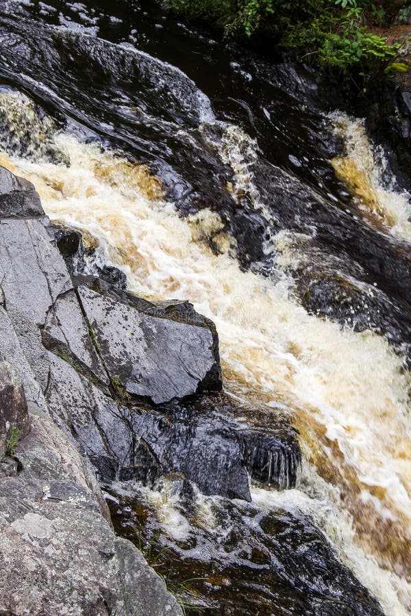 Close Up of Water Running Over Rocks at the Bottom of a River Stock ...
