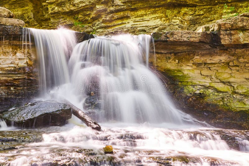 Close Up of Waterfall Splashing Against Rocks Stock Image - Image of ...