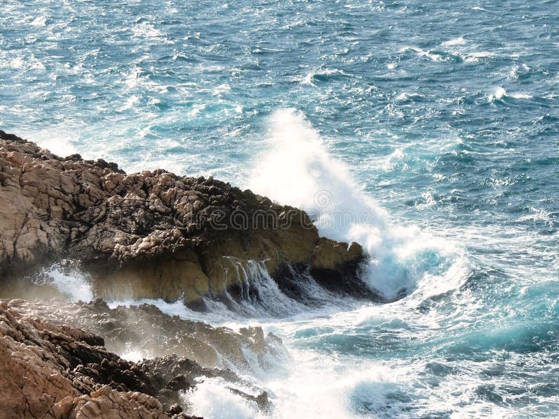 Close-up of a Wave Projected Onto a Rock in the Mediterranean Sea Stock ...