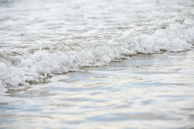 Close Up of Waves on the Shore of a Beach Stock Image - Image of foam ...