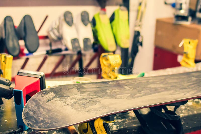 Close Up Waxed Snowboard on Repair Workshop Table. Step by Step Guide ...