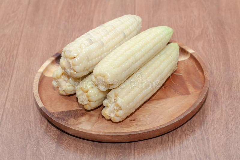 Waxy corn in wooden plate stock image. Image of diet - 128943971