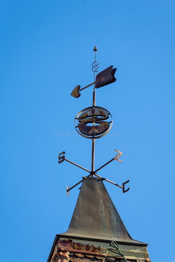 Close-up of a weather vane stock photo. Image of building - 312064992